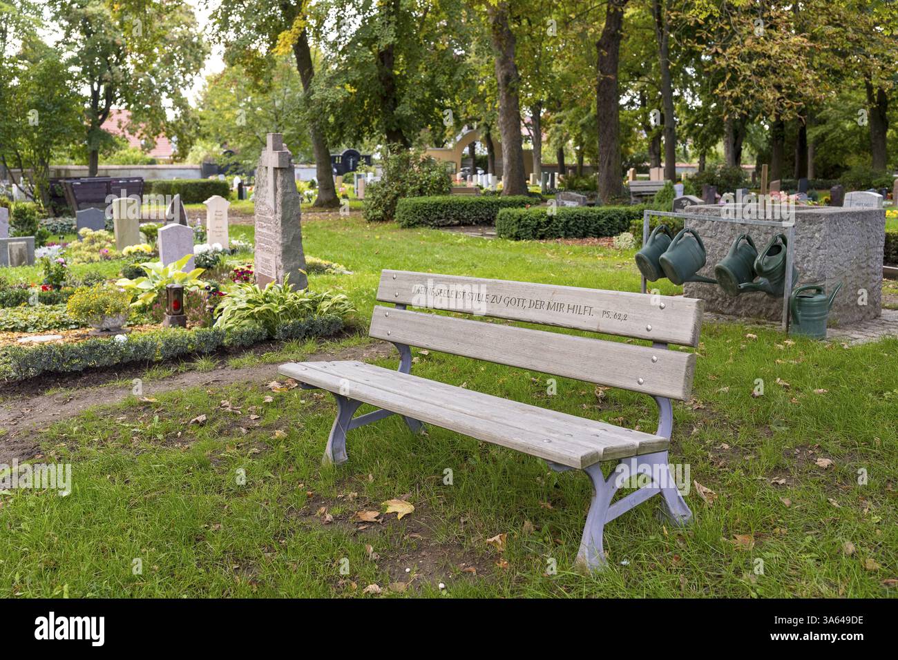 Bench with Bible verse between graves, Alleestrasse cemetery, Riesa ...