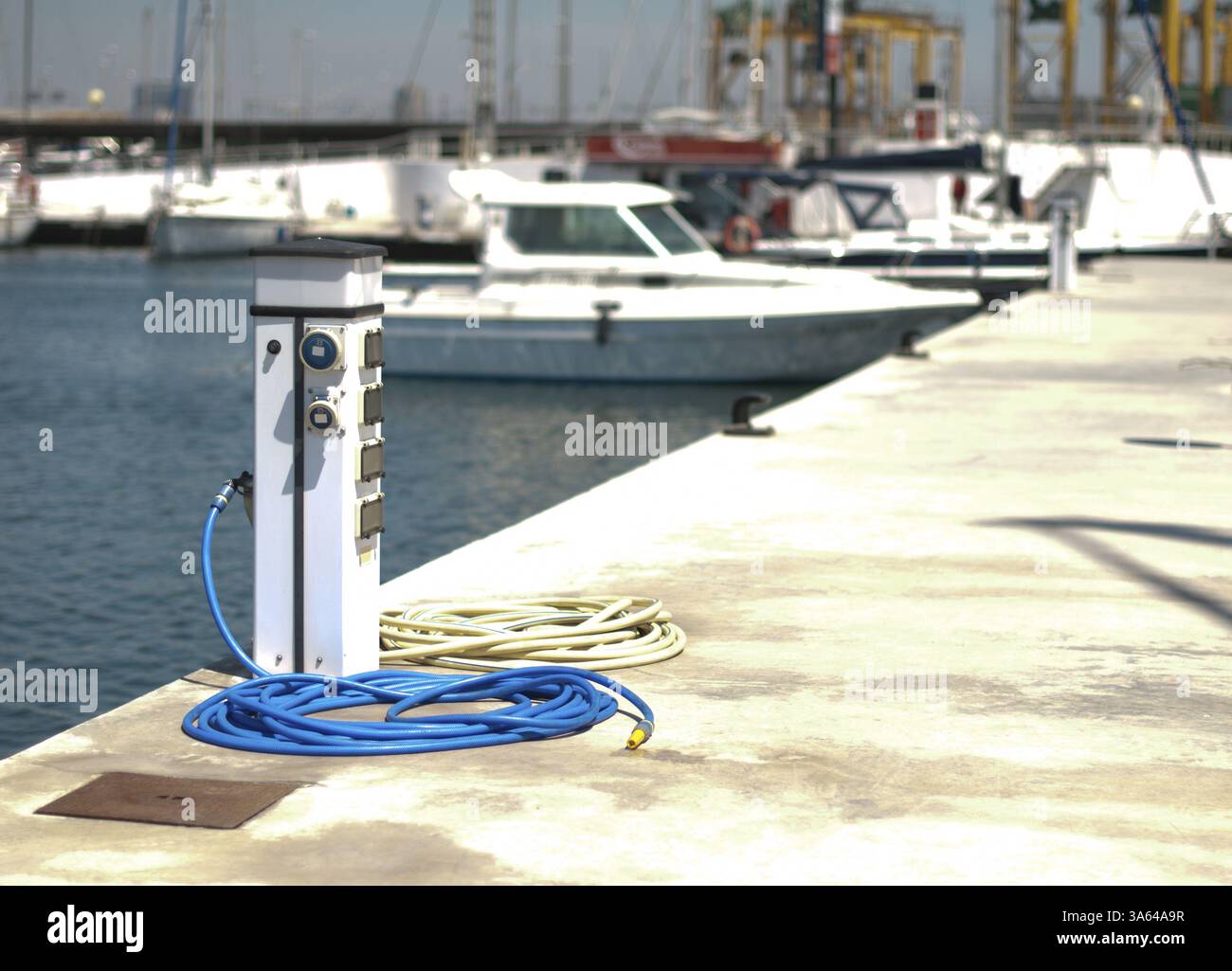 Power connector for yachts. Hose and water connection Stock Photo - Alamy