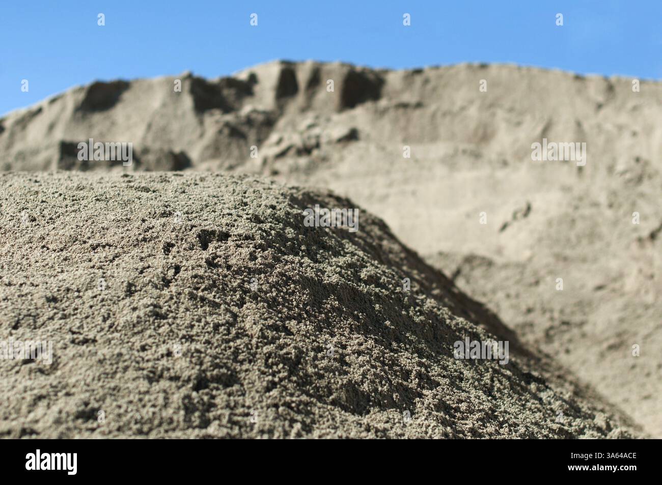 Piles of sand. Close up and far. Horizontal image Stock Photo - Alamy