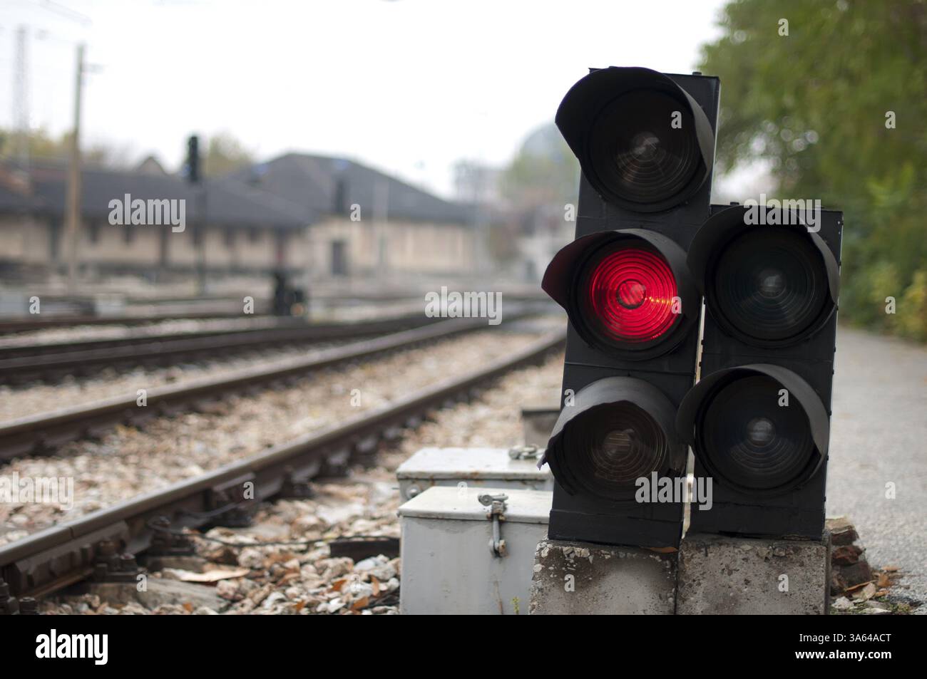 Traffic light shows red signal on railway. Red light Stock Photo - Alamy