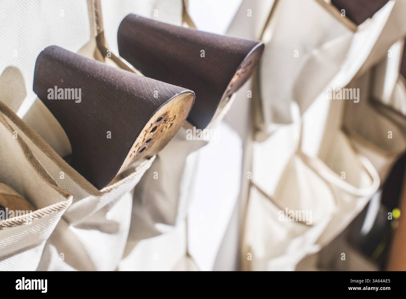 Making shoes. Wooden soles Stock Photo - Alamy