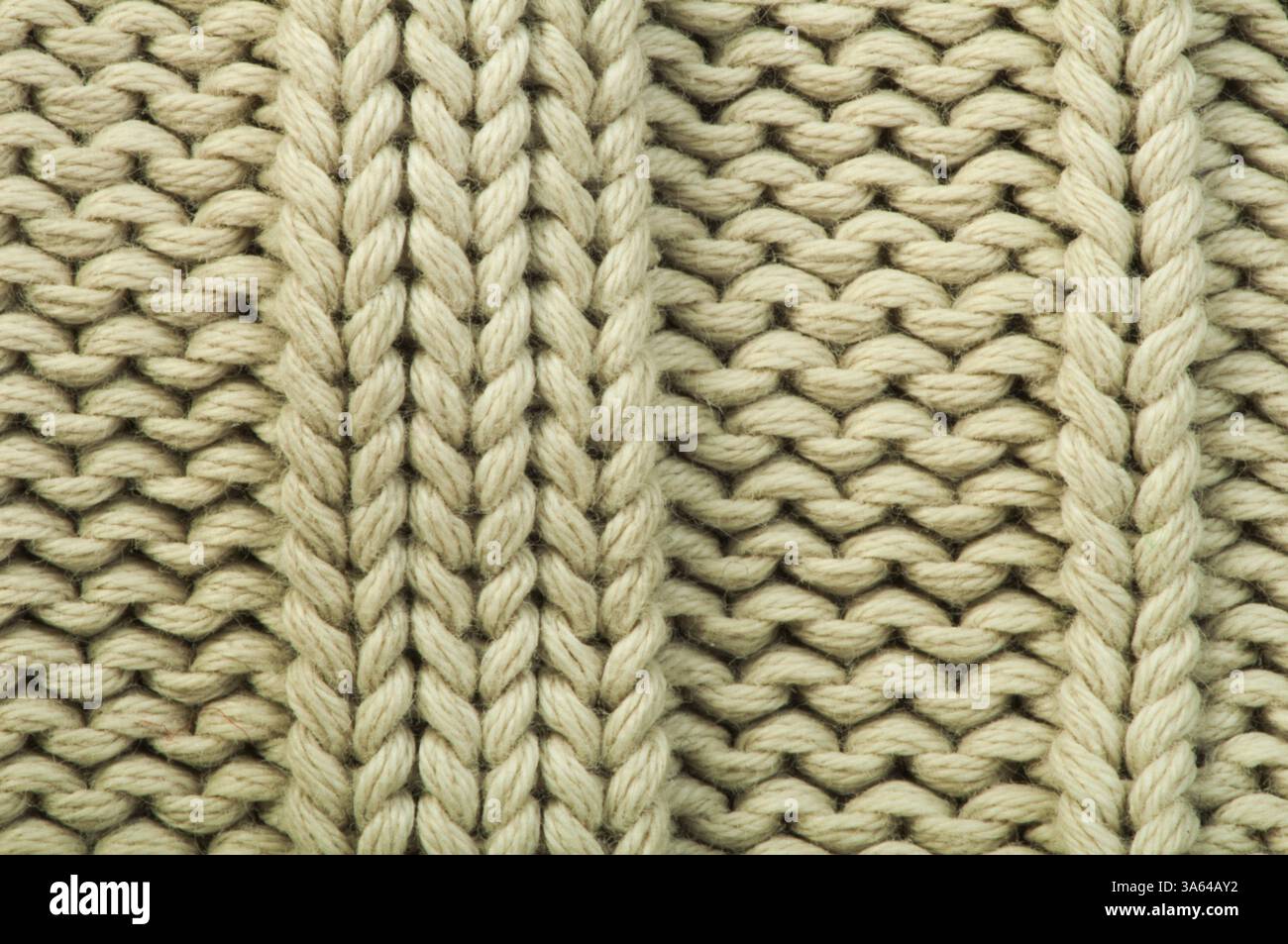 Old knit sweater background. Beige color. Studio shot Stock Photo - Alamy
