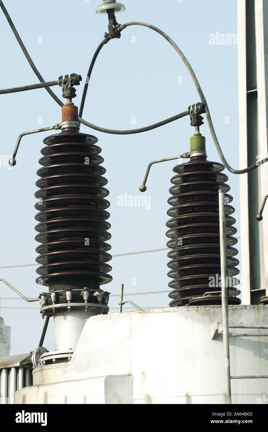 High-voltage wires and transformers. Electrical distribution station ...