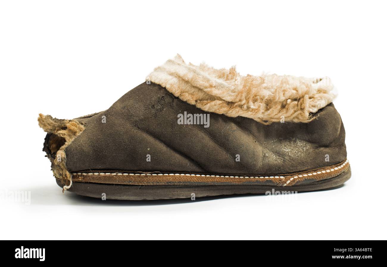 Old torn boots of leather with a hole Stock Photo - Alamy