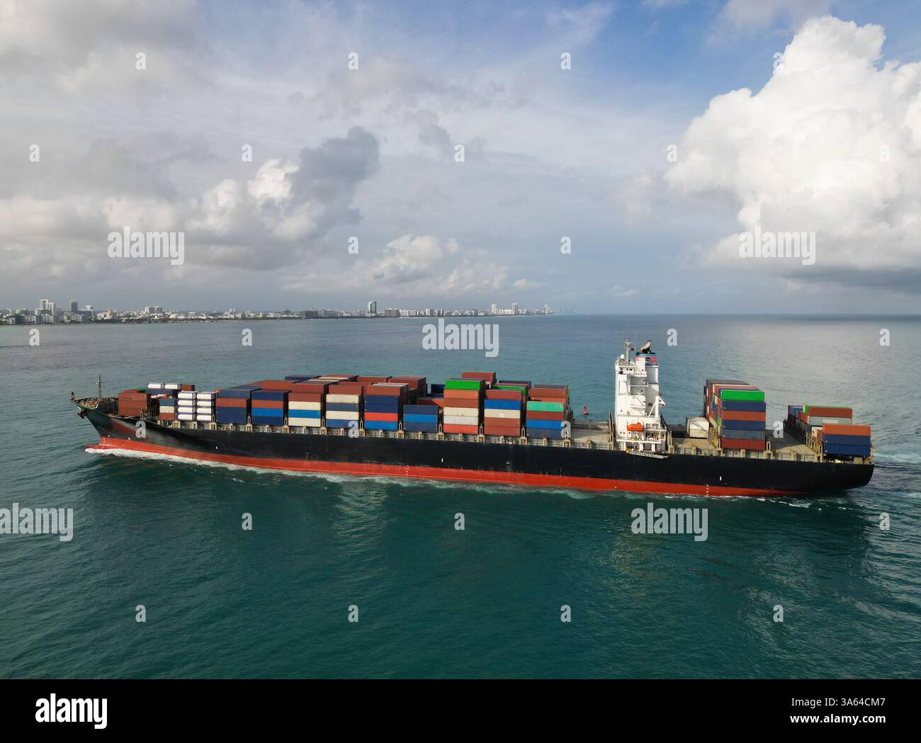 Cargo ship in sea, aerial view. Freight container on cargo vessel ...