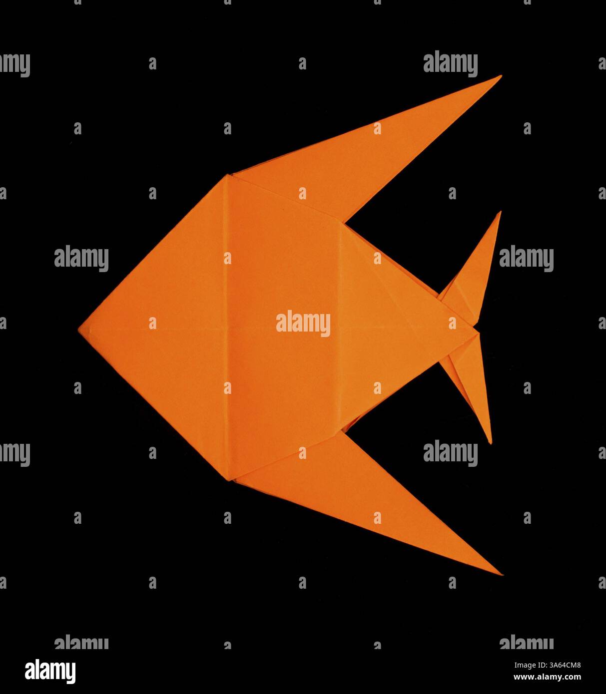 Orange fish folded origami black isolated Stock Photo - Alamy