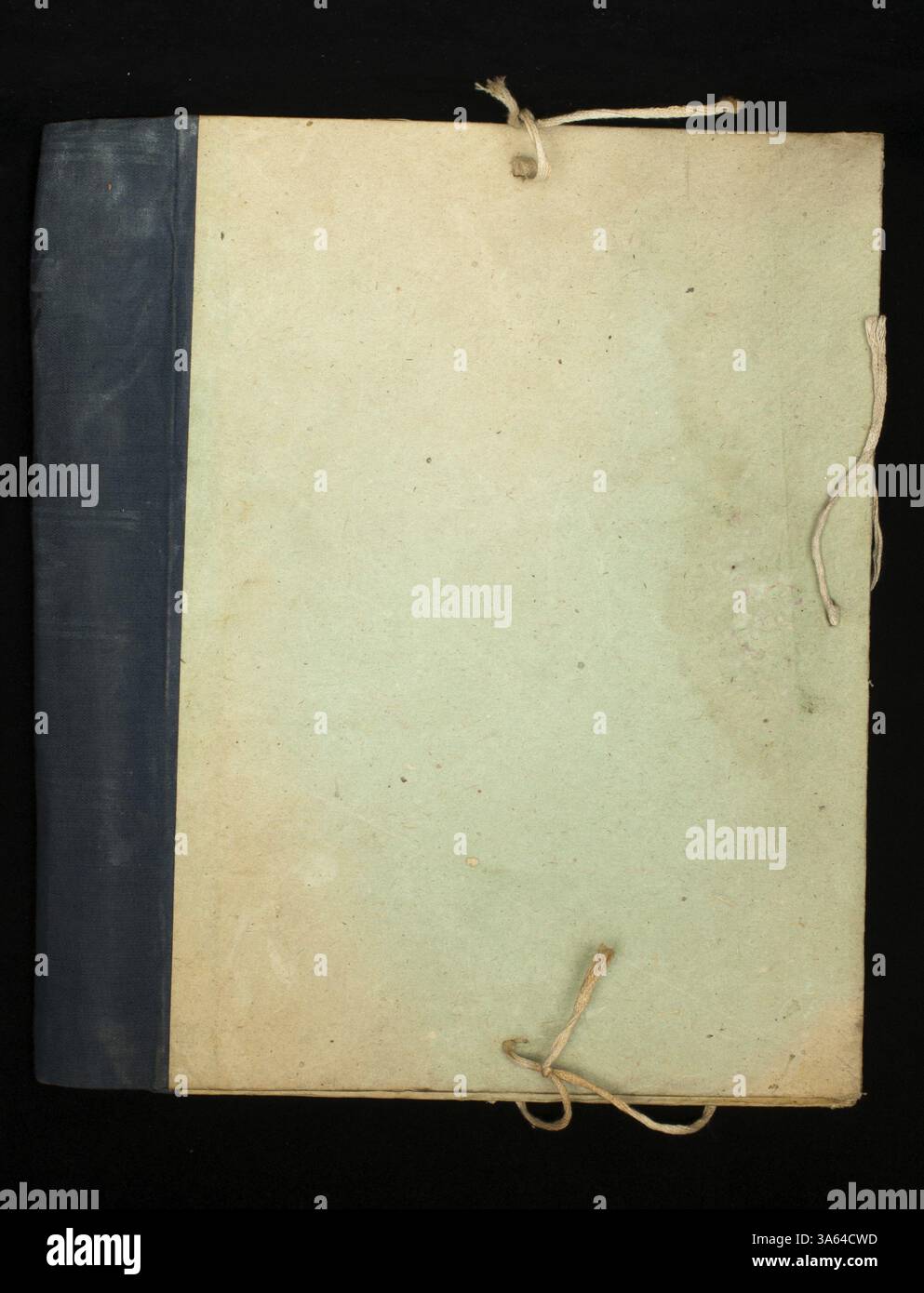 Old tattered folder tied with rope Stock Photo - Alamy