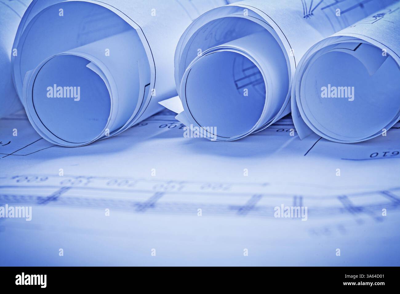 Rolled blueprints stacked hi-res stock photography and images - Alamy