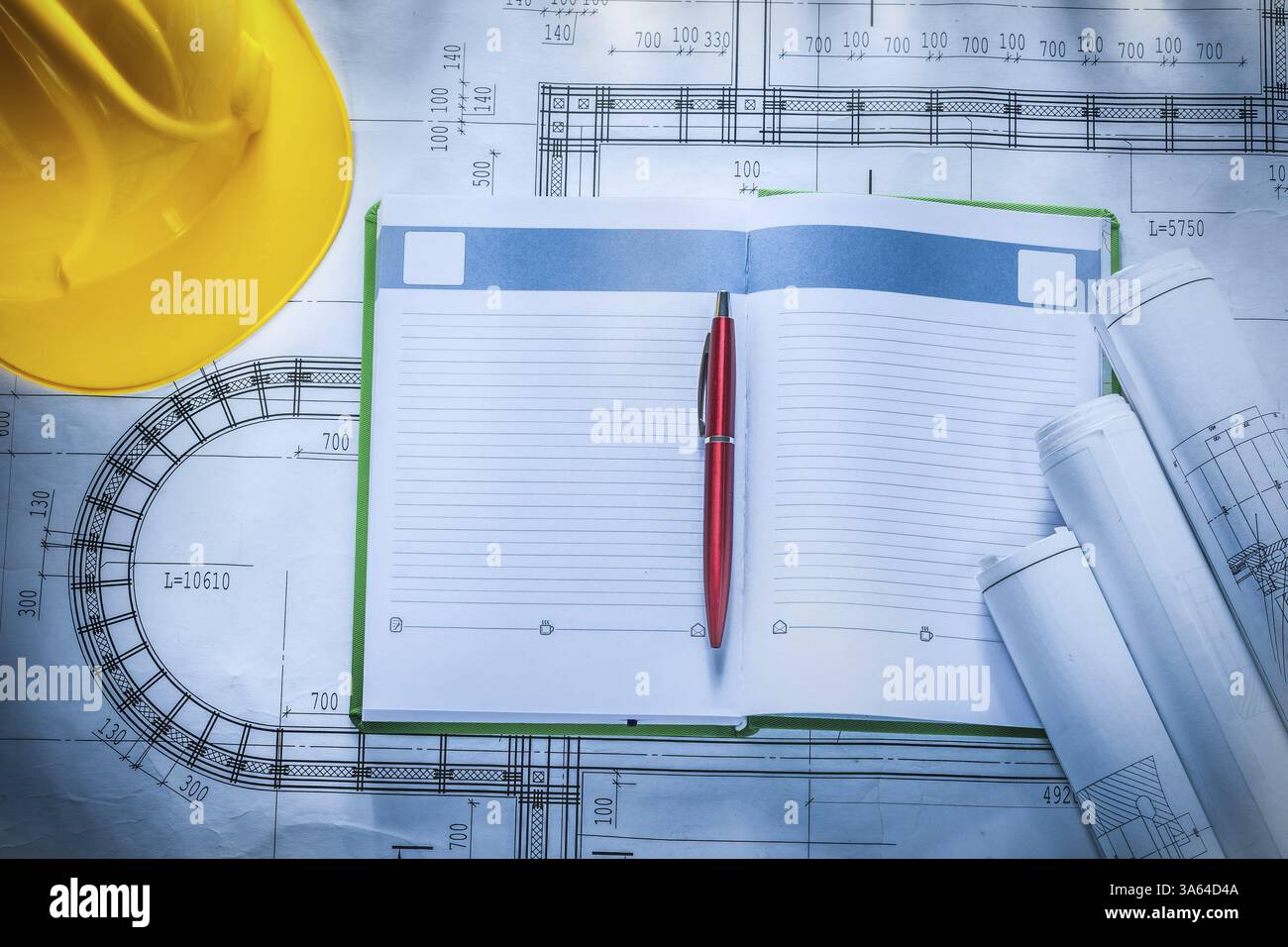 Notepad pen building helmet hi-res stock photography and images - Alamy