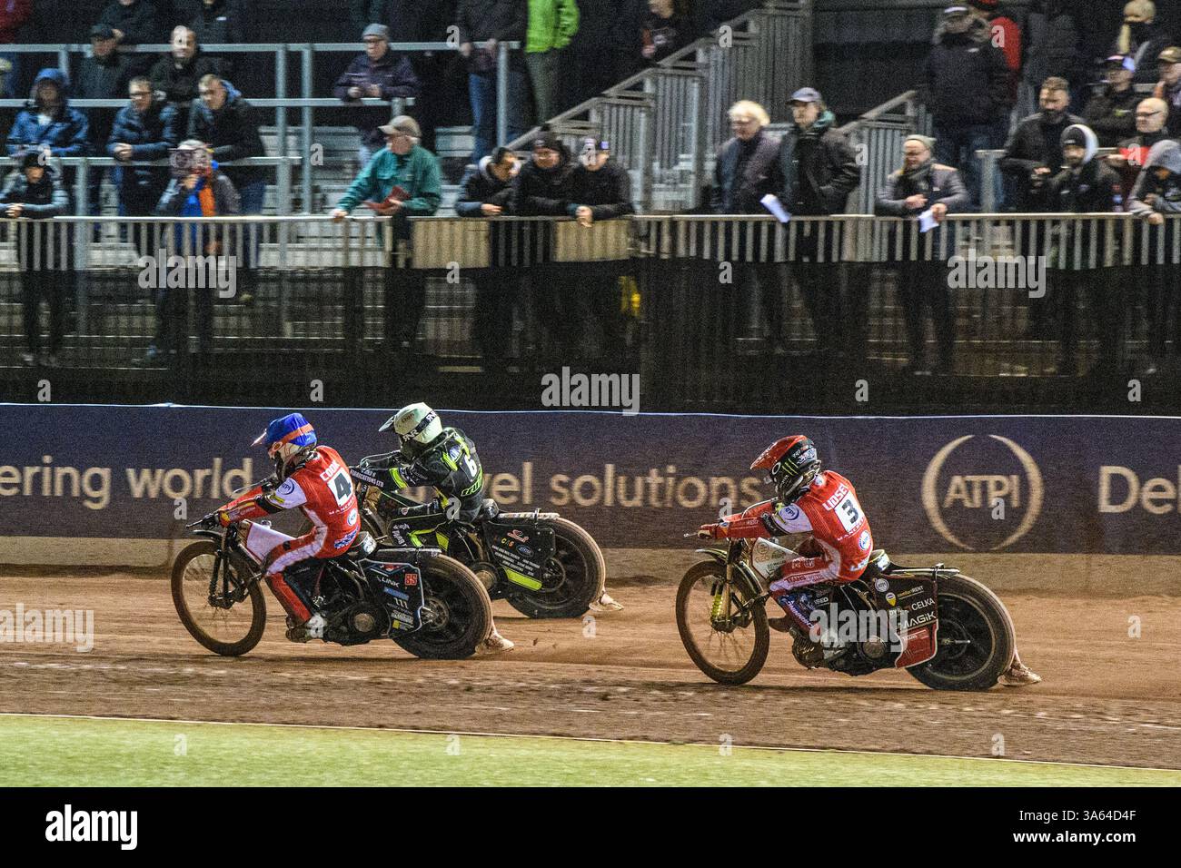 Zach Cook of Belle Vue Aces in Blue rides inside Dan Thompson of ...