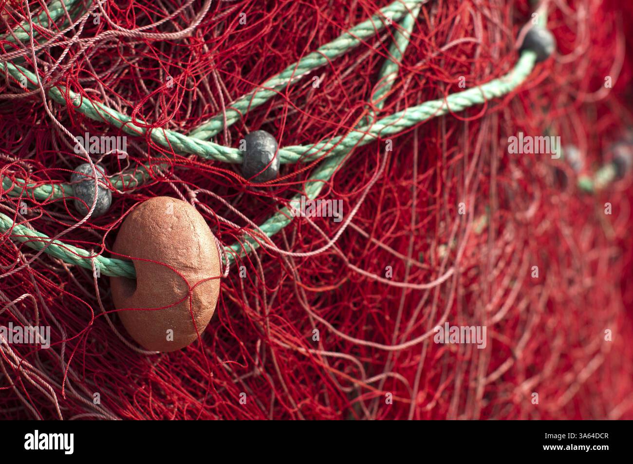 Red color fishing nets background Stock Photo - Alamy