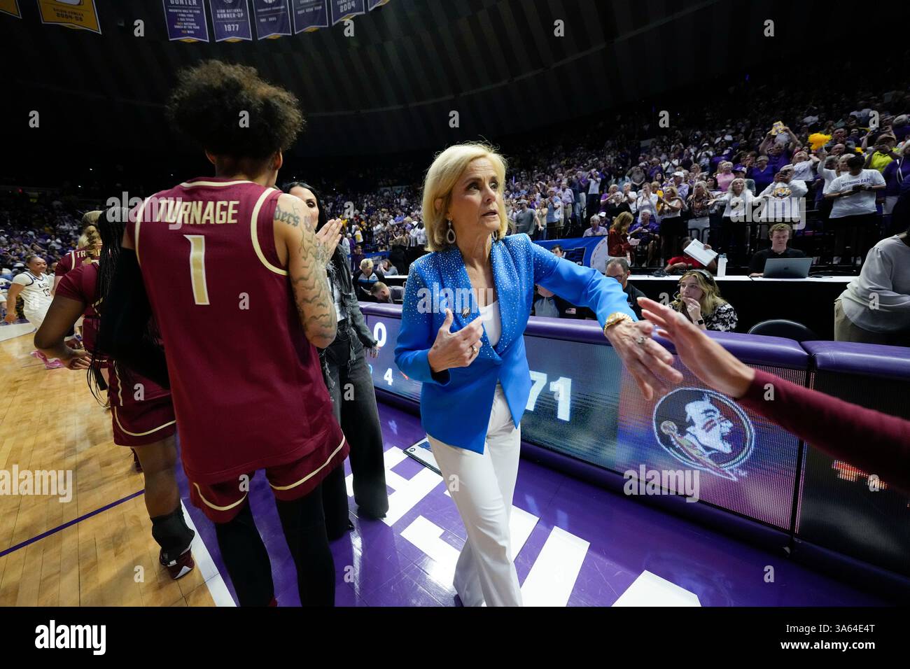 LSU head coach Kim Mulkey congratulates Florida State players after the ...