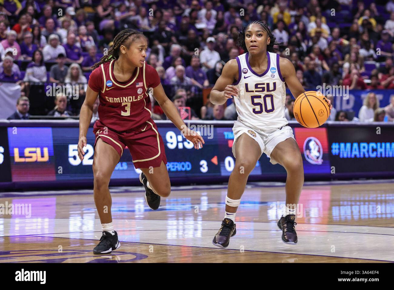 March 24, 2025: LSU's Shayeann Day-Wilson (50) tries to drive around ...