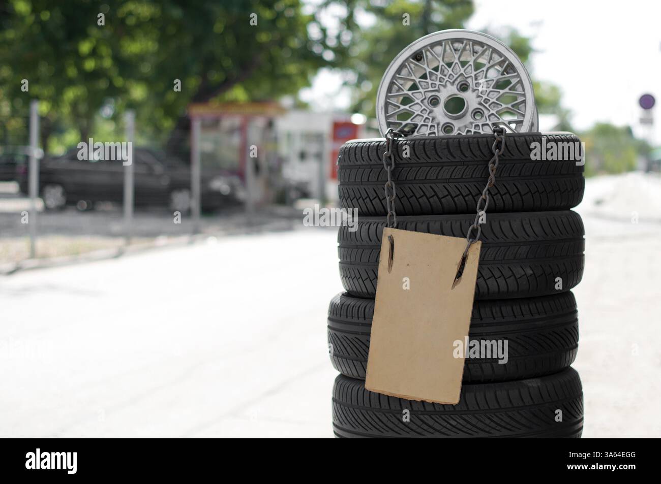 Pile of tires and rims Stock Photo - Alamy