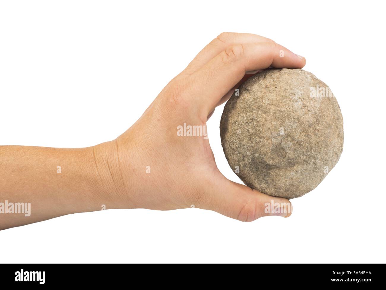 Hand holding stone ball. Piece of stone Stock Photo - Alamy