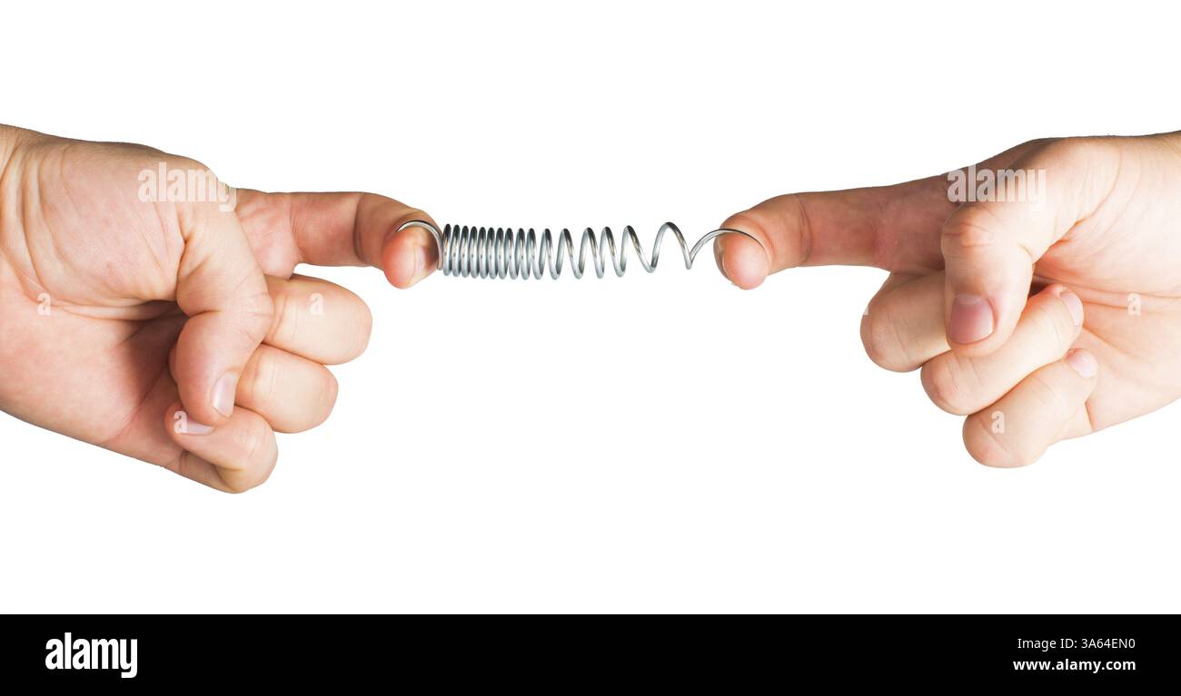 Two hands stretching spring.Stretched spring. Resistance and opposition ...