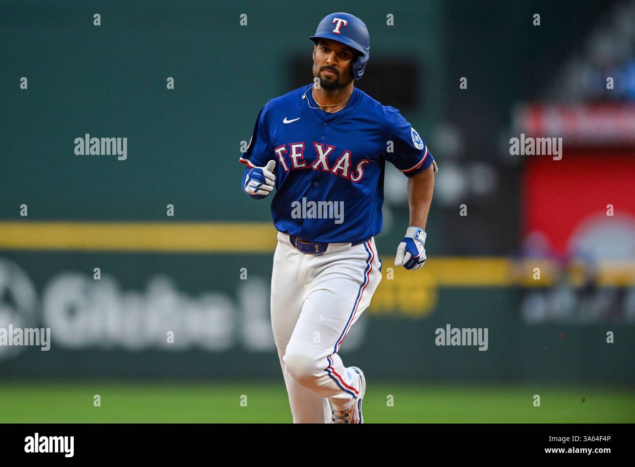 Texas Rangers' Marcus Semien rounds second base after hitting a home ...