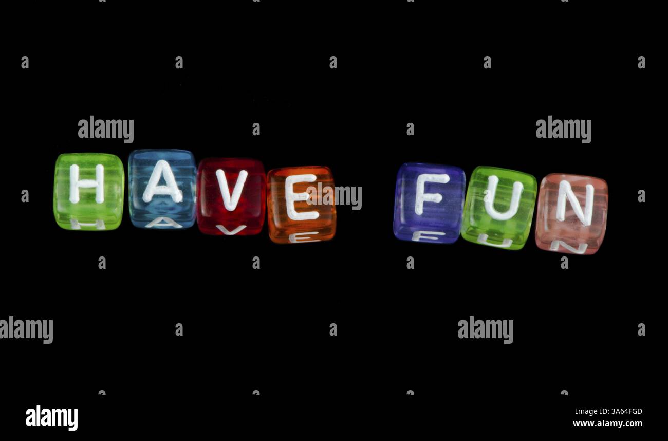 Word have fun black isolated cubes Stock Photo - Alamy
