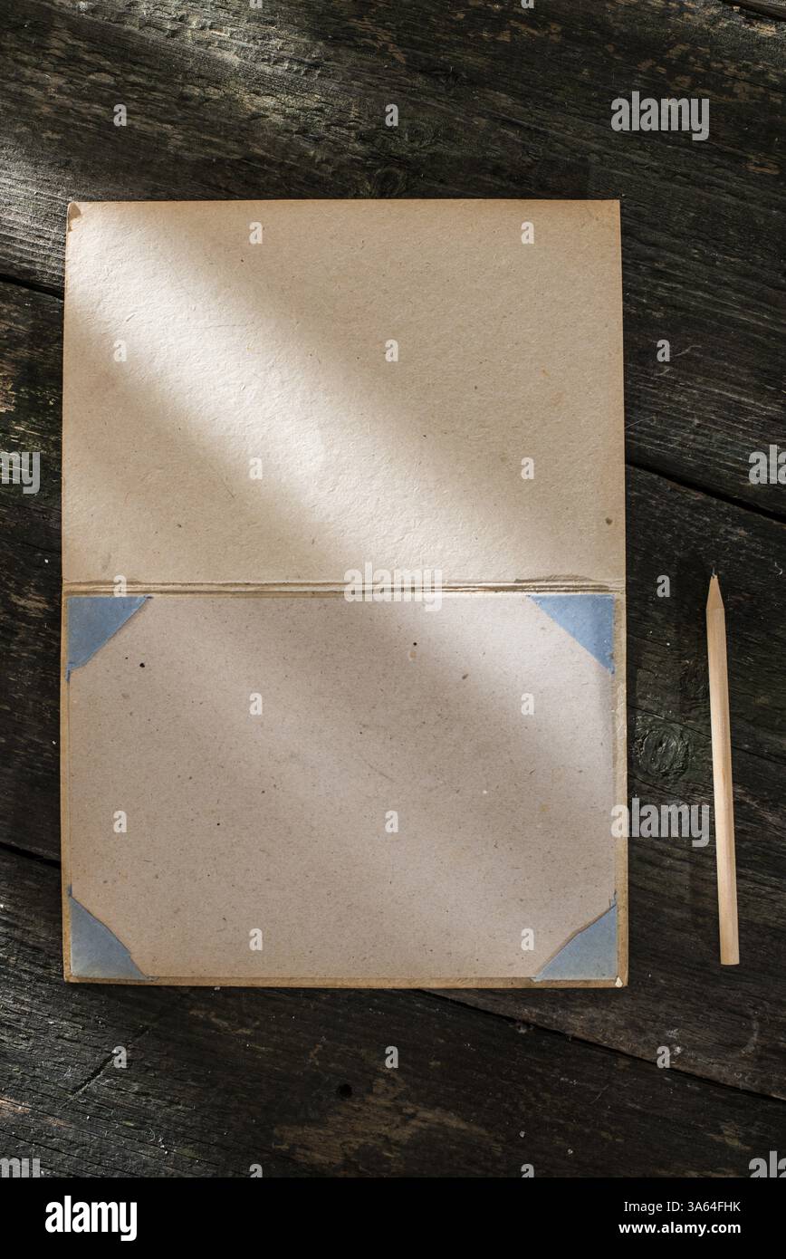Vintage pencil and drawing paper. Weak sunlight Stock Photo - Alamy