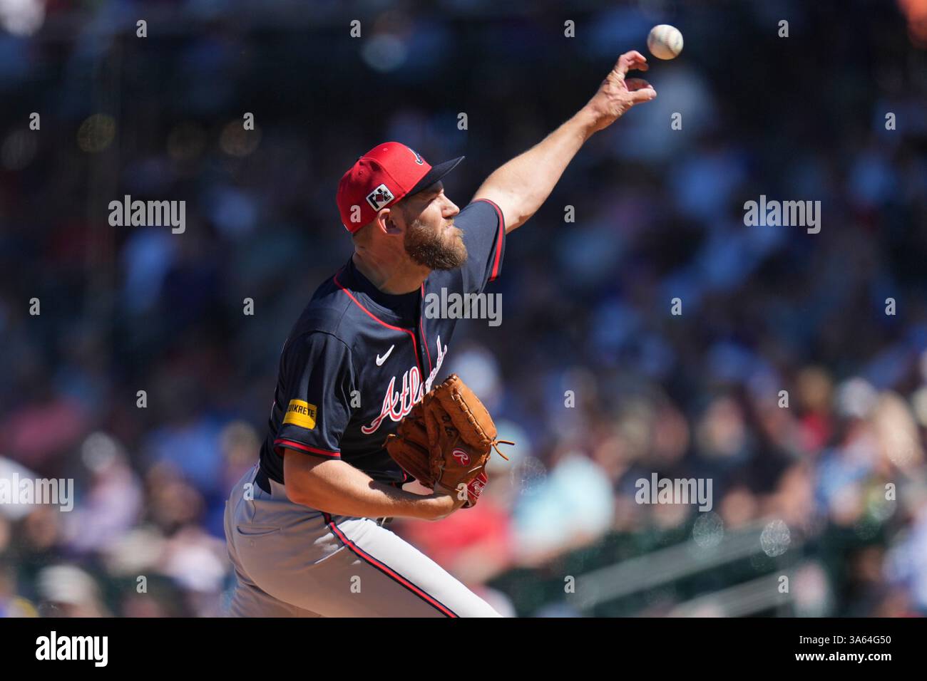Atlanta Braves pitcher Dylan Lee throws against the Chicago Cubs during ...