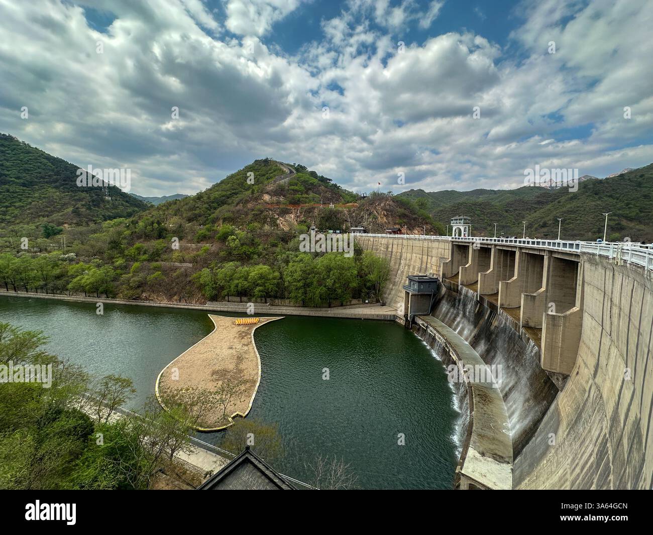 A modern dam forms the entrance to the restored section. The ...