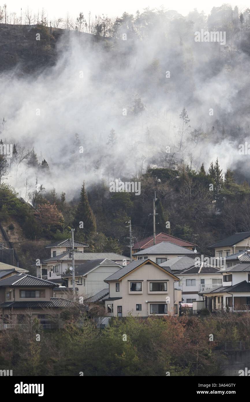 The photo shows a spreading forest fire in Imabari, Ehime Prefecture ...