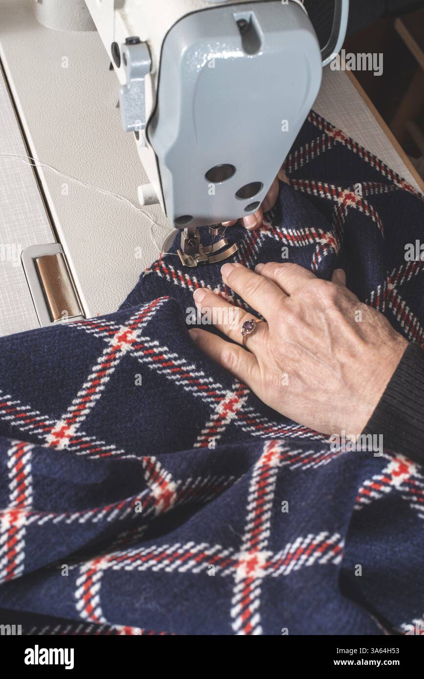 Woman working sewing machine clothing hi-res stock photography and ...