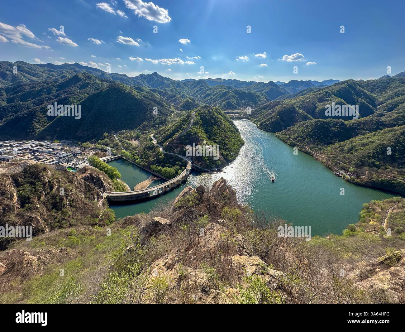 A section of wild wall surround the preserved Great Wall section at ...