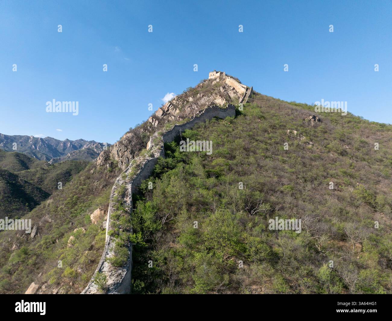 A section of wild wall surround the preserved Great Wall section at ...
