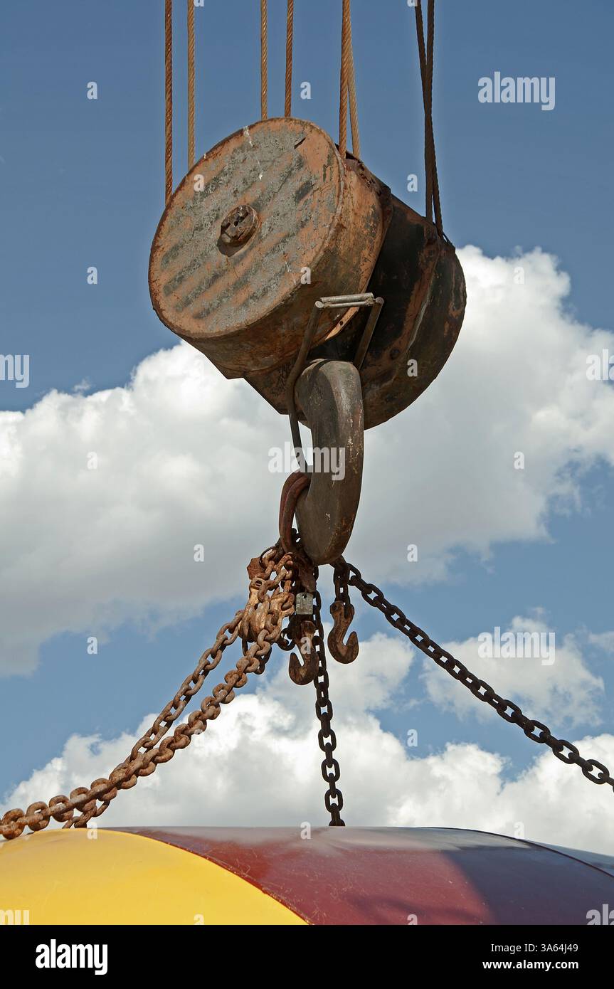Lifting hook on an old railroad crane with chains Stock Photo - Alamy