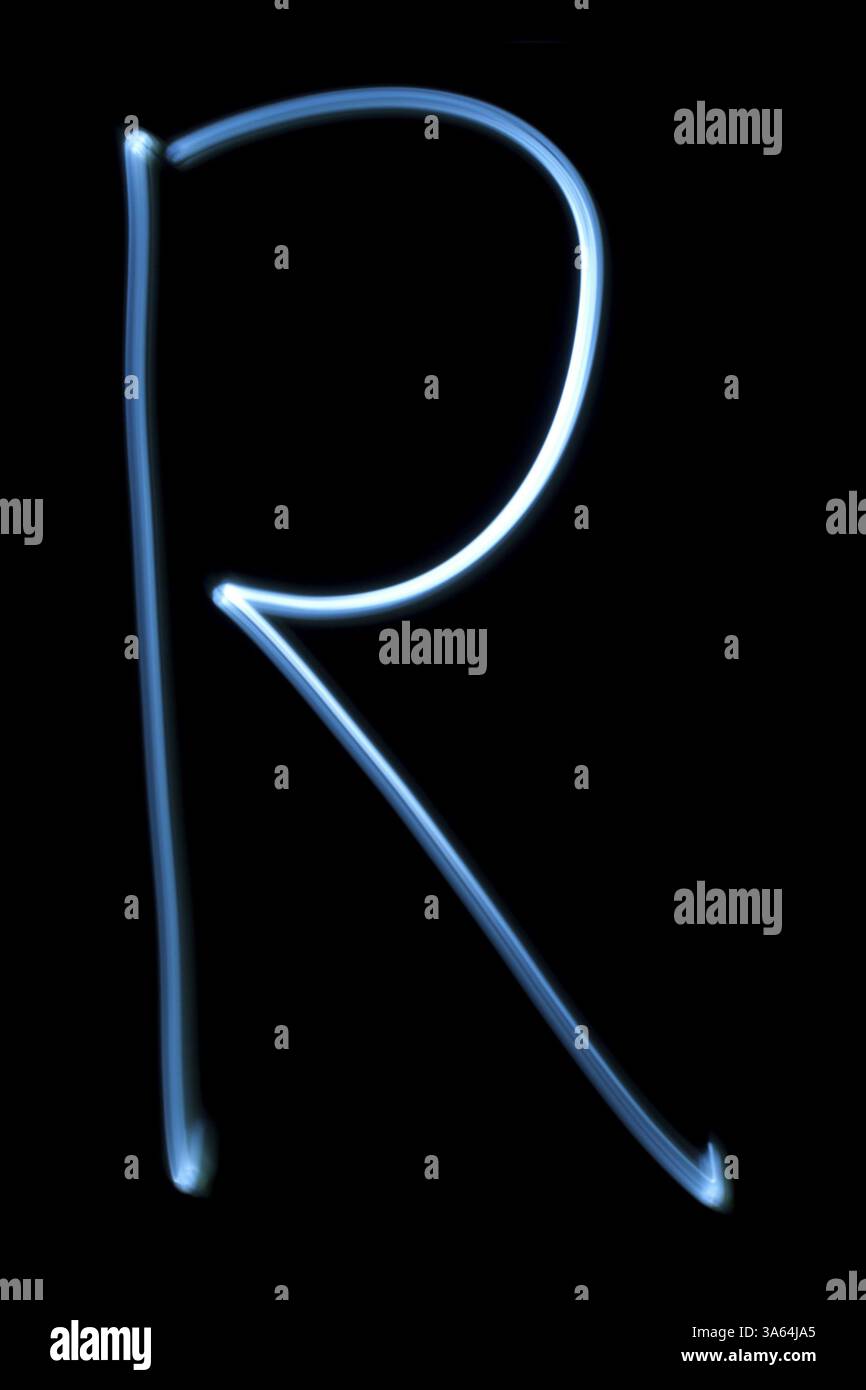 The letter R from natural neon light Stock Photo - Alamy