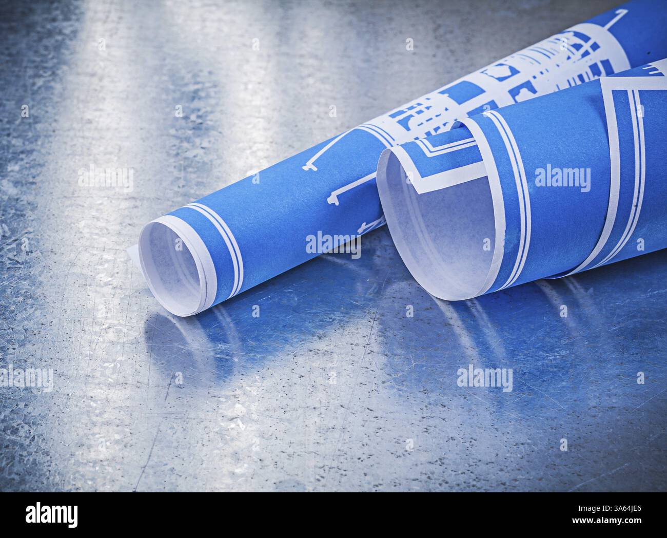 Blue engineering drawings on scratched metallic background construction ...