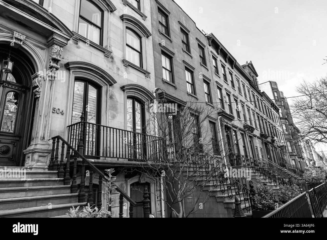 Brownstone building architecture of New York. Entrance stairs to brick ...