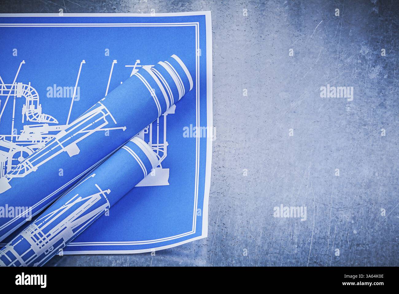 Blue construction plans on metallic background maintenance concept ...