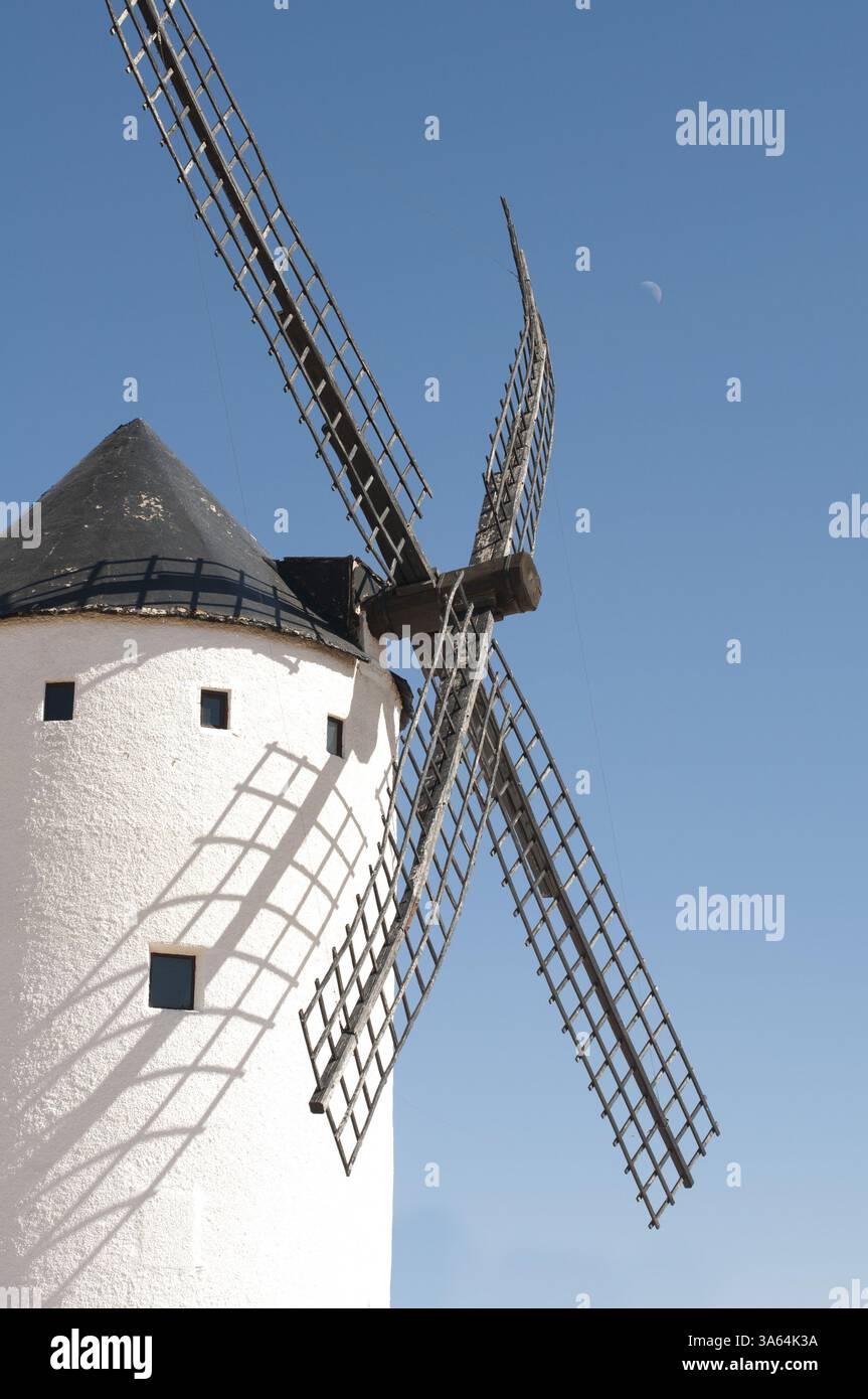 White ancient windmill. Blue sky background Stock Photo - Alamy