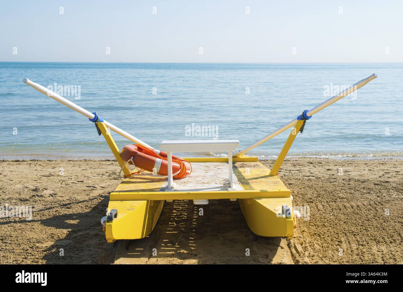 Yellow lifeboat on the beach. Italian beach Stock Photo - Alamy