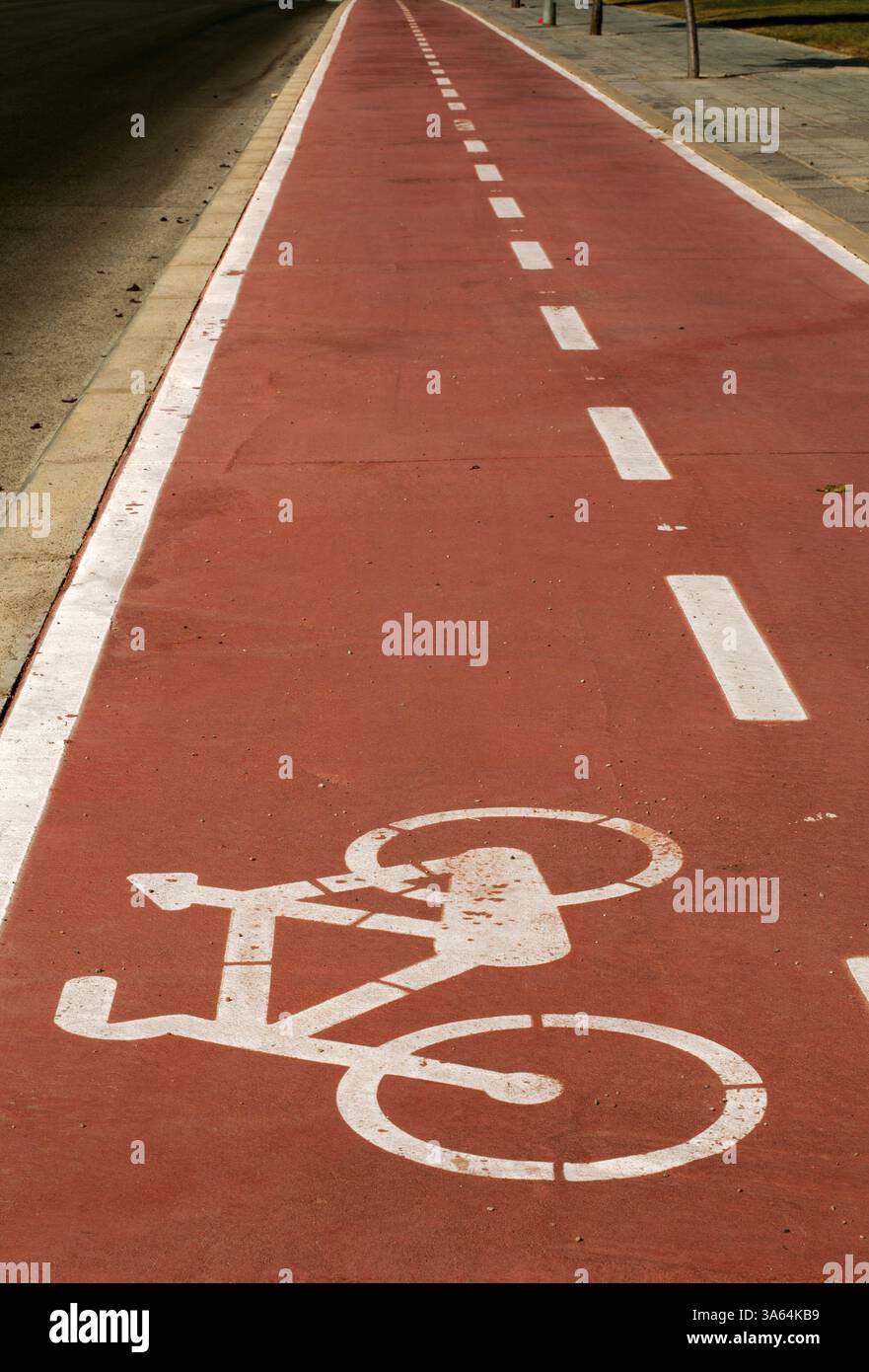 Red bike lanes and symbols Stock Photo - Alamy