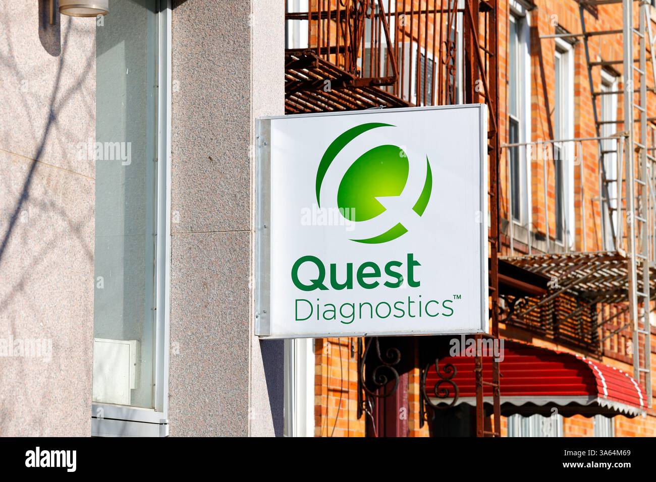 Signage for Quest Diagnostics, a clinical laboratory, at a location in ...