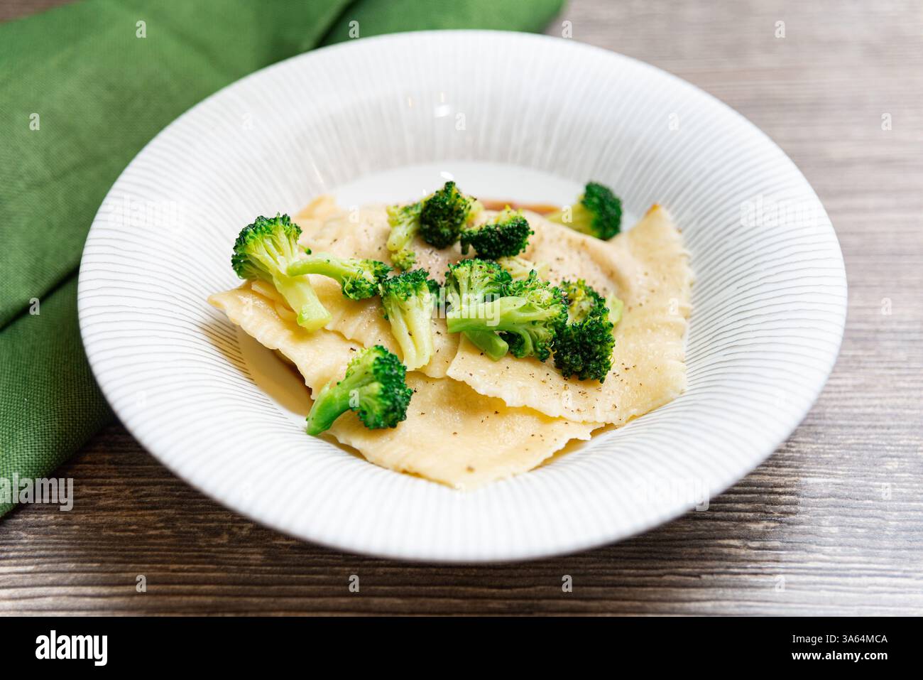 Eating delicious cheese ravioli topped hi-res stock photography and ...