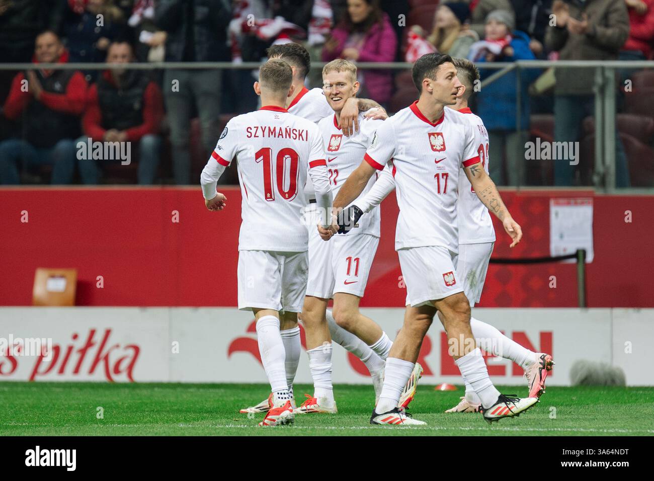 Warsaw, Poland. 24th March, 2025. Karol Swiderski (C) of Poland ...