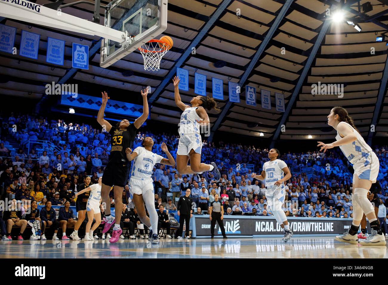 North Carolina's Indya Nivar (24) and Laila Hull (4) battle West ...