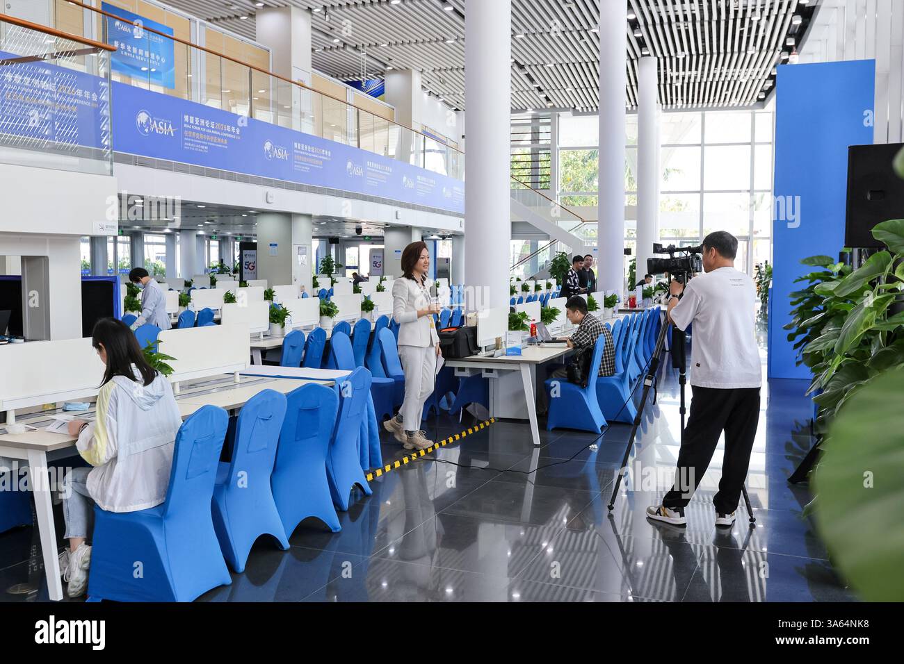 Qionghai,China.24th March 2025. The press center for the annual meeting ...