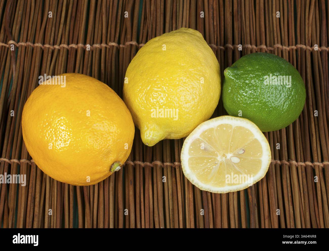 Three varieties of lemons. Yellow lemon, lime and orange lemon Stock ...