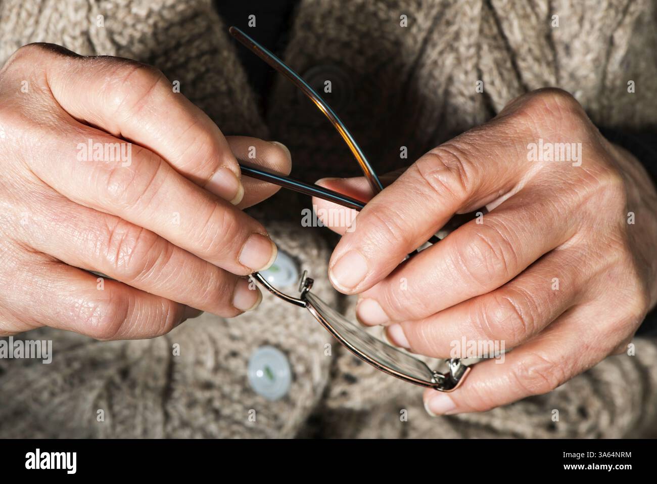 Senior women hand hold hi-res stock photography and images - Alamy