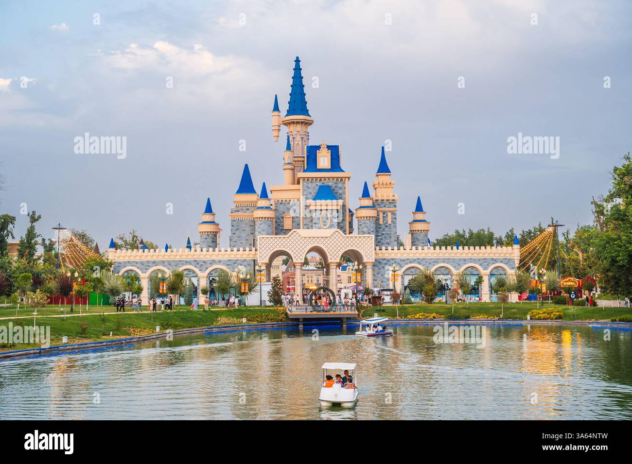 Beautiful fairy-tale castle by lake in the Magic City amusement park in ...