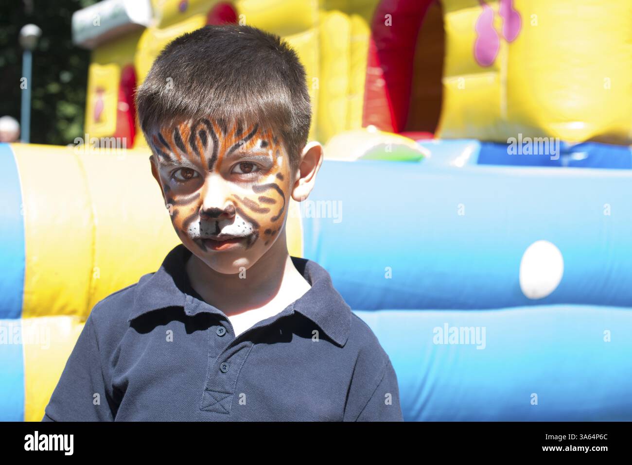 Painted tiger face on child hi-res stock photography and images - Alamy
