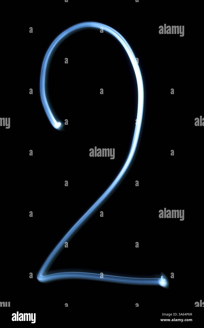 Number two digit from natural neon light Stock Photo - Alamy