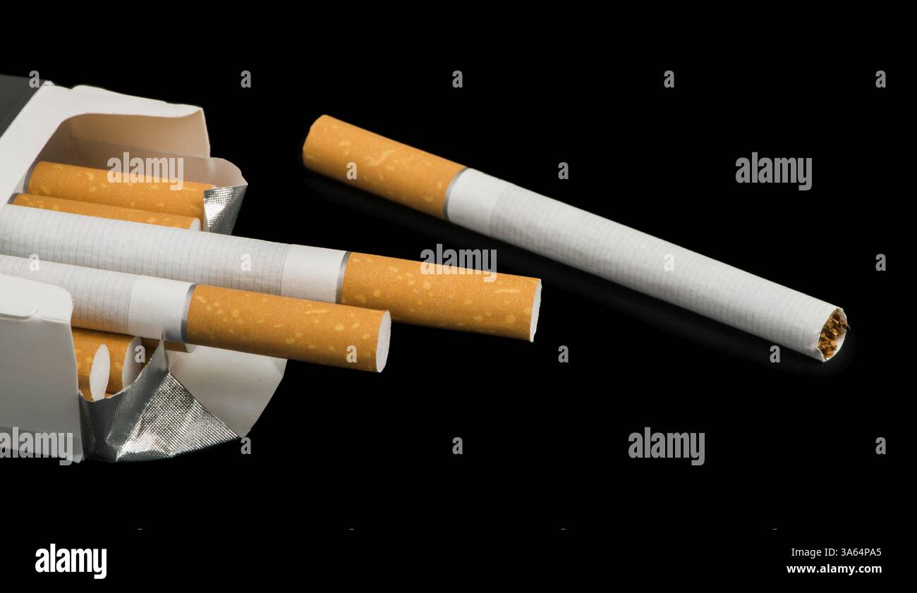 Box of cigarettes.Close up black isolated studio shot Stock Photo - Alamy