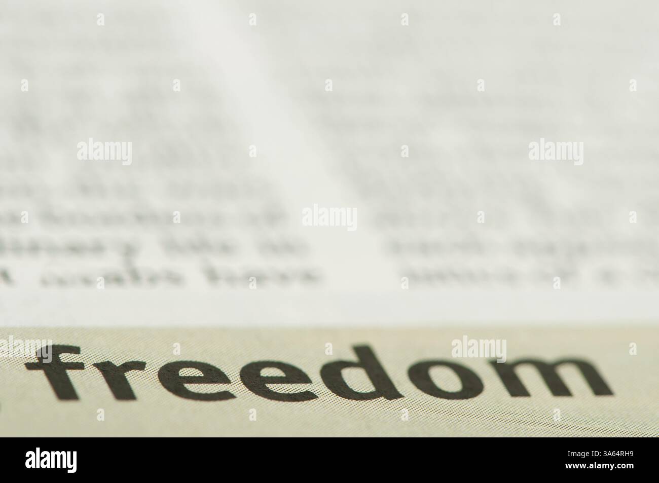 Word Freedom on newspaper Stock Photo - Alamy