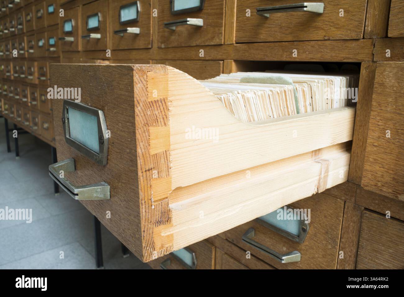 Old archive with wooden drawers Stock Photo - Alamy